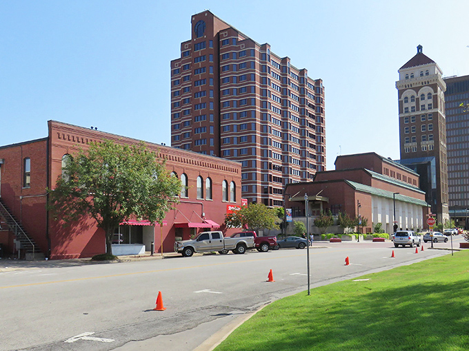 Downtown Bartlesville's historic brick buildings stand like sentinels of a bygone era, where oil money met prairie ambition.