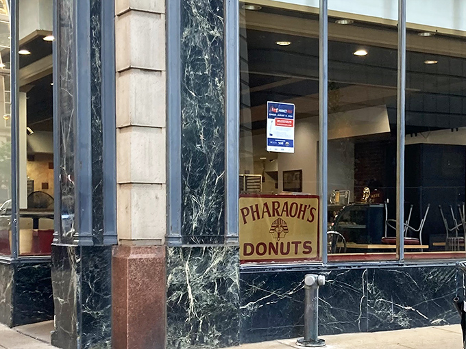 The historic downtown storefront beckons like a siren song for donut lovers, with its classic architecture making it look like the Federal Reserve of Fried Dough. 
