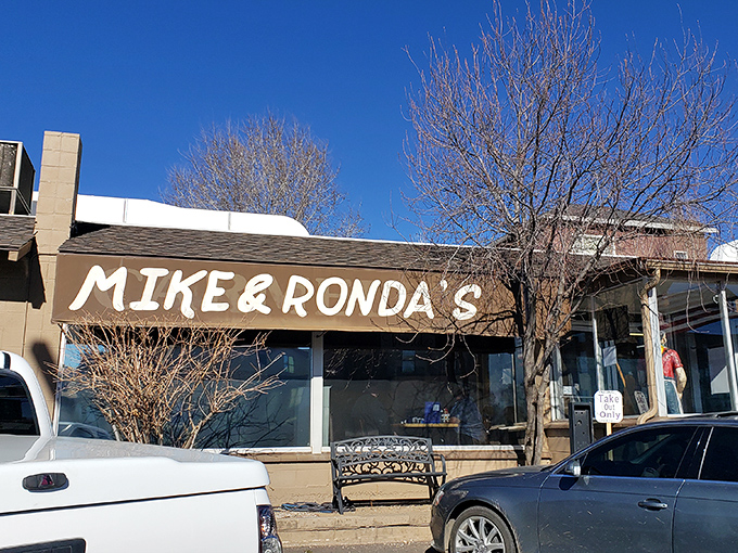 The unassuming exterior that fools passersby daily. That hand-painted sign isn't flashy, but it might as well say "Food Nirvana Ahead."