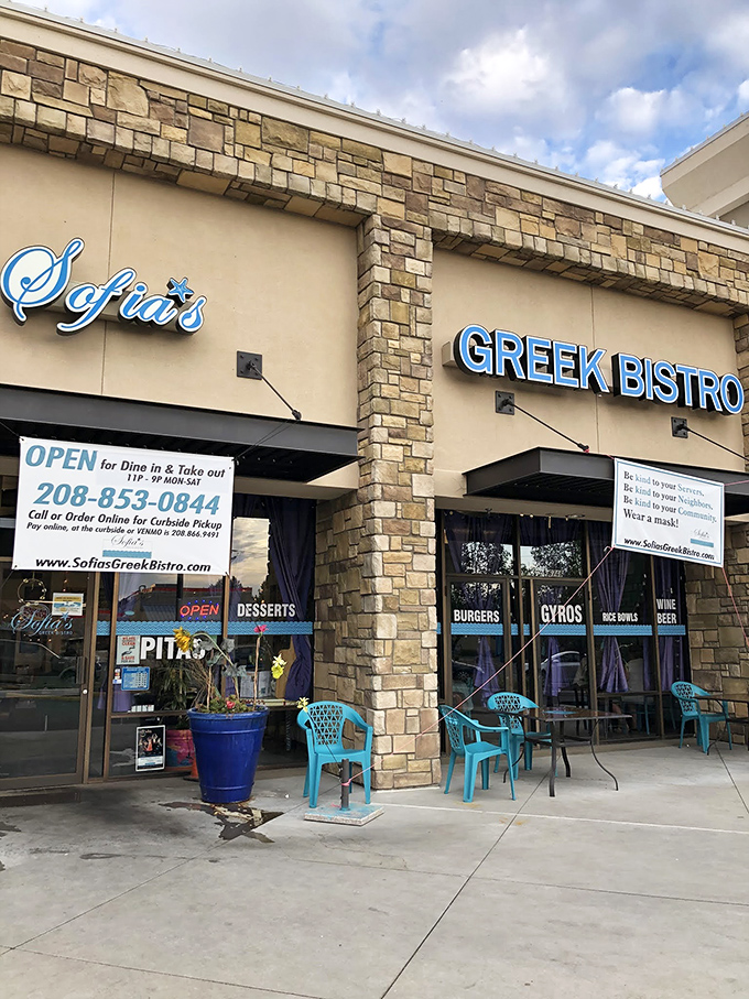 Sofia's Greek Bistro welcomes hungry travelers with its stone facade and bright blue umbrellas&mdash;a little slice of Santorini in suburban Garden City.
