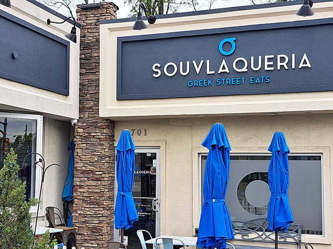 Souvlaqueria's modern storefront beckons with its distinctive blue eye logo, promising Greek street food that'll transport you straight to Athens without the jet lag.