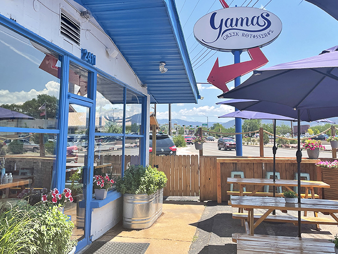 The blue-trimmed exterior of Yamas stands out like a Mediterranean oasis in Santa Fe, complete with that can't-miss red arrow guiding hungry travelers home.