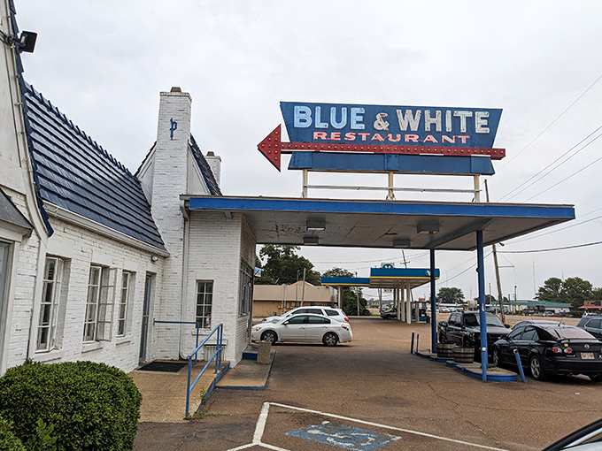 The iconic blue roof and vintage sign beckon like an old friend. This isn't just a restaurant&mdash;it's a Mississippi landmark that's been serving comfort for generations. 