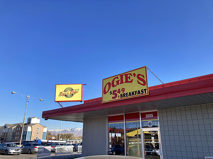 Ogie's bright yellow sign beckons hungry travelers like a breakfast lighthouse in West Valley City's sea of strip malls.