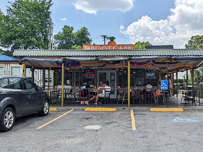 The Root Cafe's colorful shipping container exterior is like a Wes Anderson film set that happens to serve incredible breakfast.