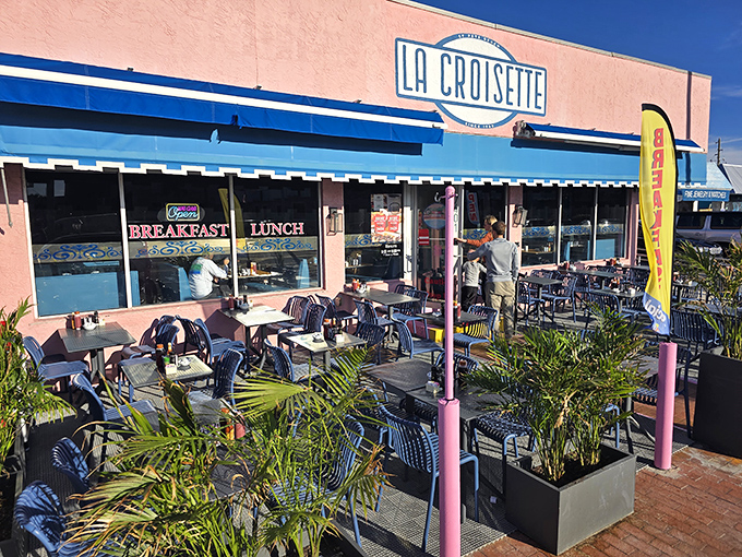 La Croisette's cheerful pink exterior with blue awnings stands out like a French postcard come to life on St. Pete Beach.