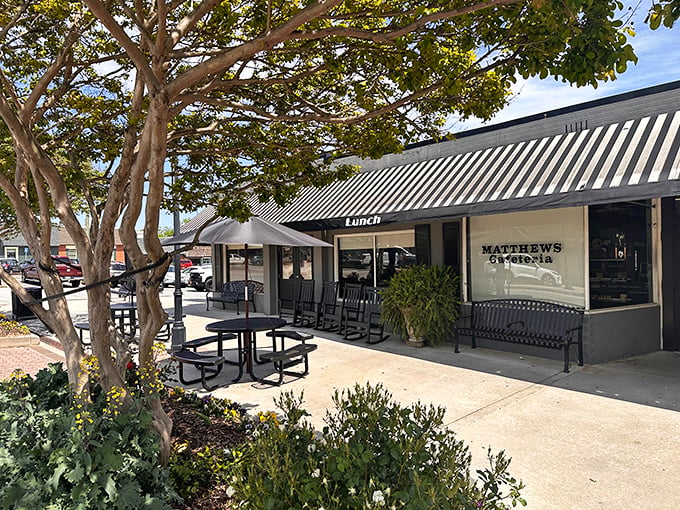 The classic black and white awning at Matthews isn't just a shelter &ndash; it's a beacon of hope for hungry souls seeking Southern salvation.