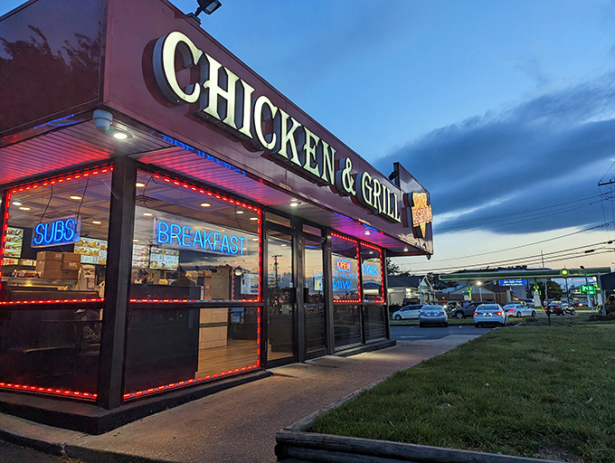 The neon-trimmed exterior of Legends Chicken & Grill glows like a beacon for fried chicken pilgrims, promising salvation from ordinary meals in strip mall heaven.
