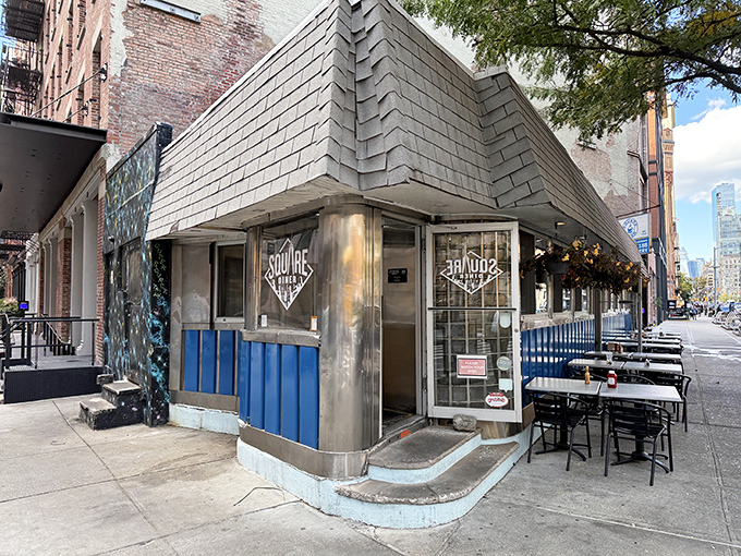The iconic blue panels and stainless steel trim of Square Diner stand defiant against Tribeca's modernization, like your favorite uncle who refuses to upgrade his flip phone.