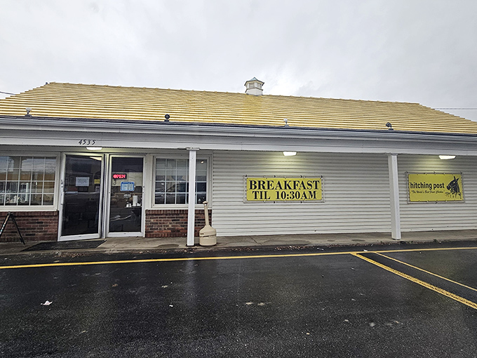 The unassuming exterior of culinary greatness. That yellow "BREAKFAST TIL 10:30AM" sign might as well read "Life-Changing Chicken Beyond This Point."