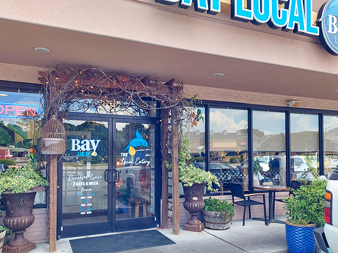 The unassuming exterior hides culinary treasures within. Like finding a pearl in an oyster, Bay Local Eatery's strip mall location belies the seafood magic happening inside.