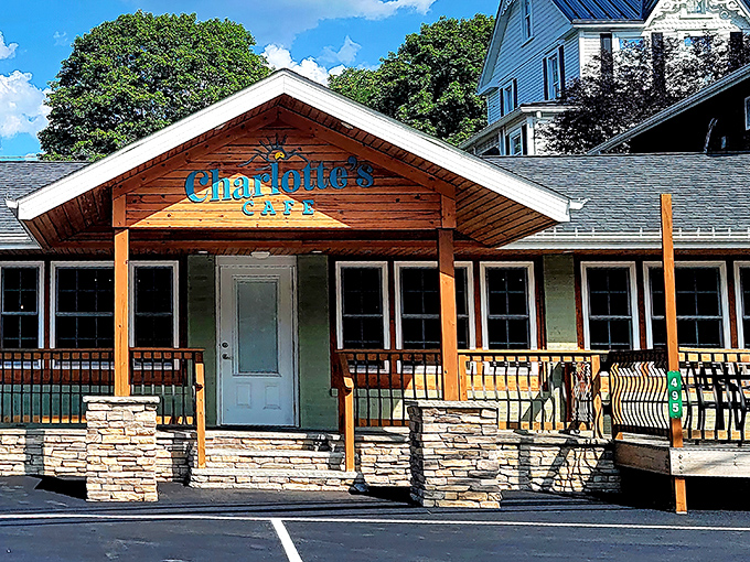 The welcoming wooden facade of Charlotte's Cafe beckons like an old friend, promising comfort and culinary delights within its cozy walls.