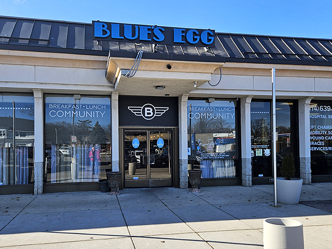 The blue awning beckons like a breakfast lighthouse, guiding hungry souls to this Milwaukee morning haven where French toast dreams come true.