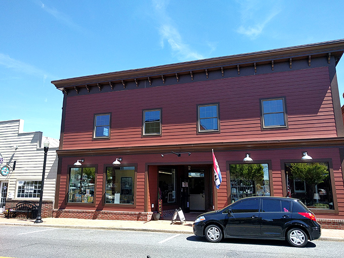 The iconic red building stands like a beacon of nostalgia on Milton's Union Street, promising treasures that Instagram filters can't replicate.