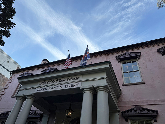 The blush-colored mansion stands proudly on Reynolds Square, proving that real men (and buildings) can wear pink and still look absolutely magnificent.