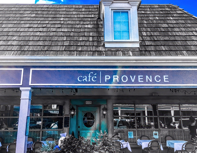 The charming fa&ccedil;ade of Caf&eacute; Provence beckons with its blue awning&mdash;a slice of Southern France hiding in plain sight in Prairie Village.