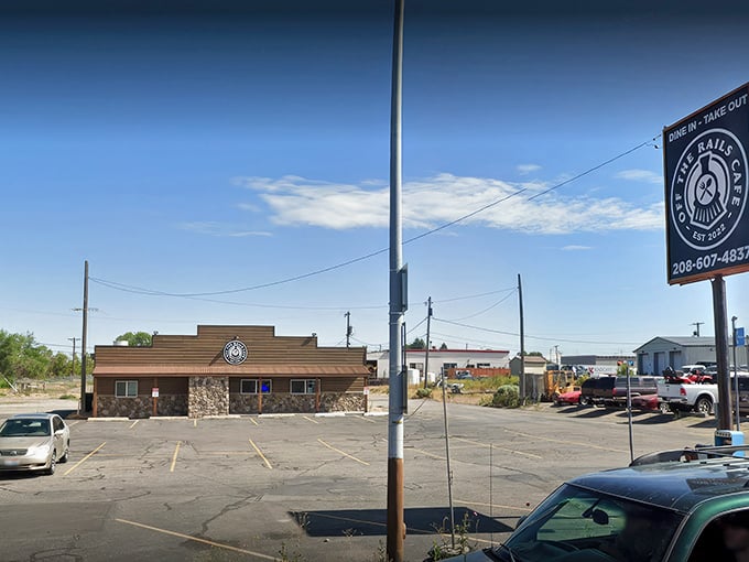 The unassuming exterior of Off The Rails Cafe stands like a culinary frontier outpost, promising hearty delights within those rustic wooden walls.