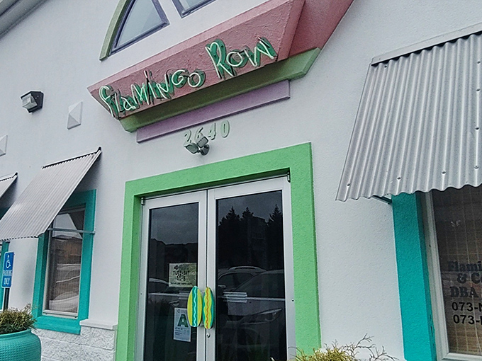 The turquoise planters standing guard at Flamingo Row's entrance are like tropical sentinels, welcoming you to this Kentucky-meets-Caribbean oasis in Paducah.