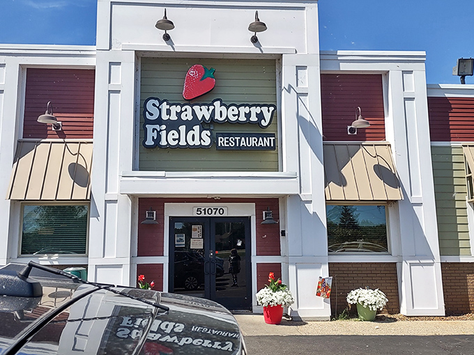 The white facade with its cheerful strawberry logo promises comfort food with a side of Beatles nostalgia. A culinary Yellow Submarine awaits!