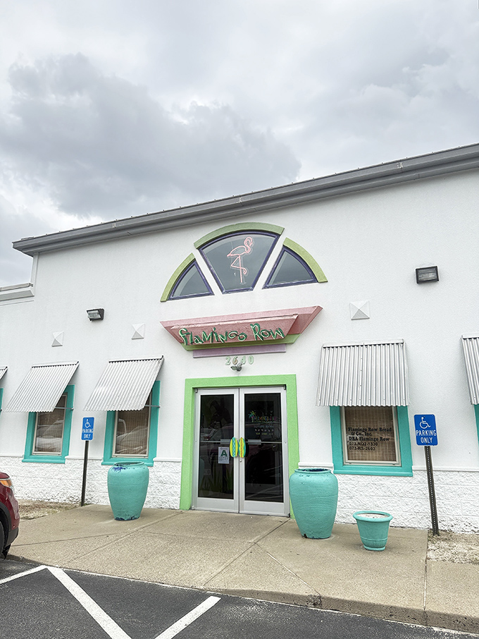 The turquoise planters standing guard at Flamingo Row's entrance are like tropical sentinels, welcoming you to this Kentucky-meets-Caribbean oasis in Paducah.