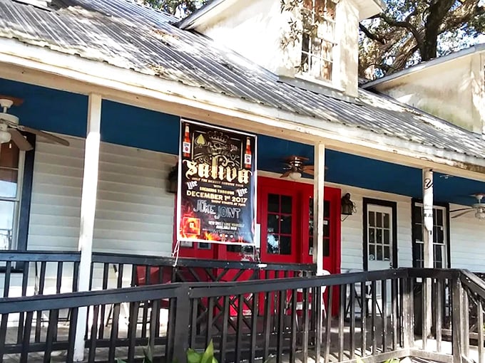 The Juke Joint's charming exterior welcomes you like an old friend, with sprawling oak trees providing nature's perfect canopy for this Mississippi treasure.