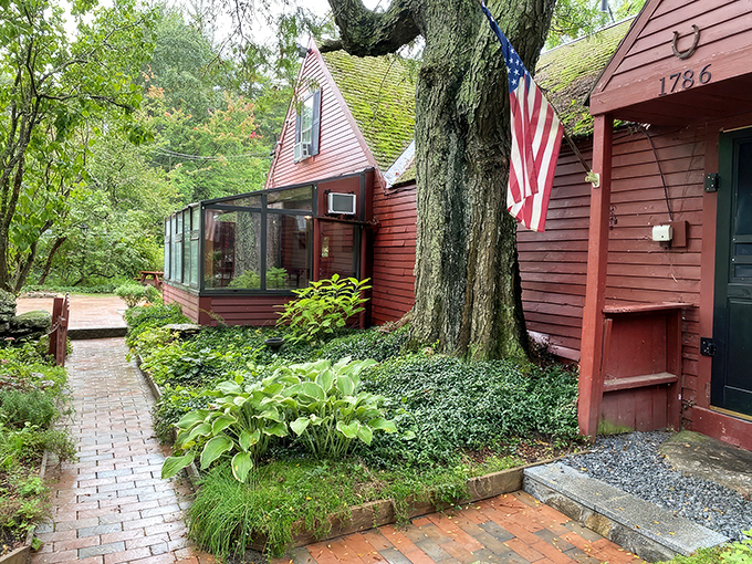 This storybook cottage isn't just charming—it's the actual inspiration for "Little Red Riding Hood" illustrations. Grandma's house never looked so inviting!
