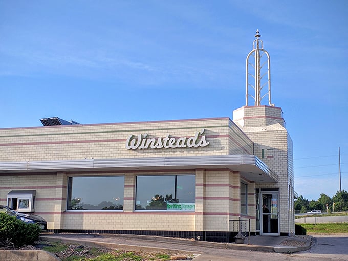 The iconic Art Deco exterior of Winstead's stands like a time capsule of Americana, complete with that distinctive tower that says "good food happens here."