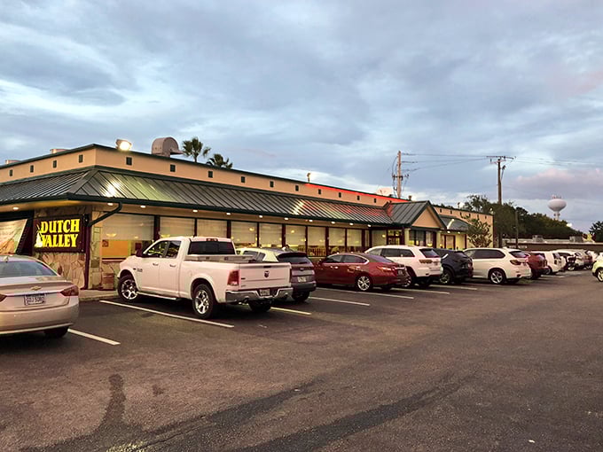 The iconic red Dutch Valley sign welcomes hungry travelers like a lighthouse guiding ships to comfort food harbor. That motorcycle knows what's up!