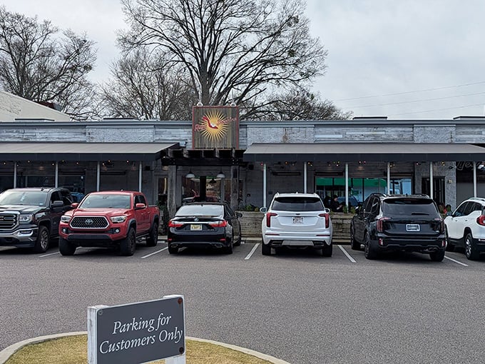 Ruby Sunshine's welcoming exterior beckons breakfast enthusiasts with its distinctive sun logo, promising morning delights worth setting your alarm for.