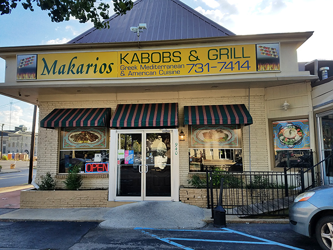 The Mediterranean promised land awaits! Makarios Kabob & Grill's inviting storefront in Birmingham beckons with its striped awnings and promise of authentic flavors.