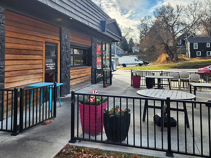 That neon pink SCBC sign glows like a breakfast beacon, promising morning salvation to hungry Omahans seeking refuge from ordinary eggs. 