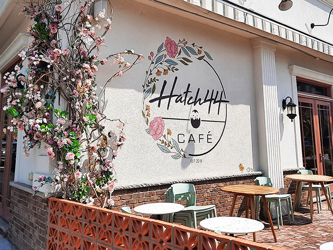 Hatch44's pristine white exterior with striped awnings isn't just inviting&mdash;it's practically winking at you to come inside for breakfast magic.