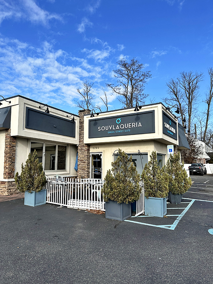 Souvlaqueria's modern storefront beckons with its distinctive blue eye logo, promising Greek street food that'll transport you straight to Athens without the jet lag.