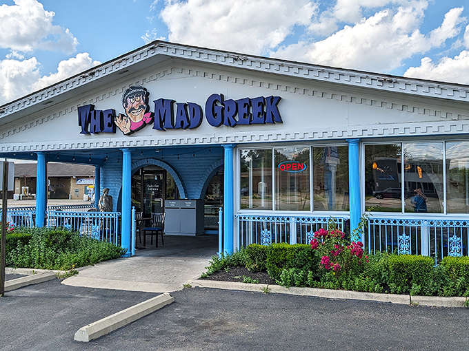 The blue-trimmed facade of The Mad Greek stands like a cheerful Santorini postcard dropped into Columbus. Greek hospitality awaits! 