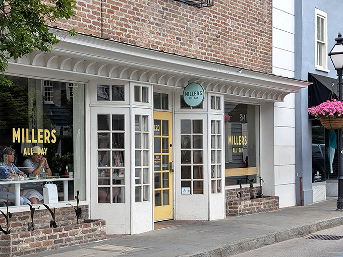 A glimpse of paradise through paned windows&mdash;Millers All Day's inviting exterior promises breakfast bliss behind that cheerful yellow door.