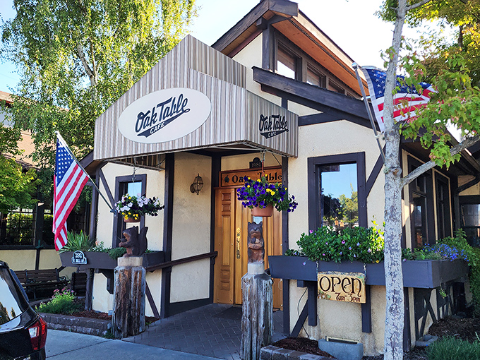 The timber-framed facade of Oak Table Cafe welcomes you like a breakfast hug. Those hanging flower baskets aren't just pretty&mdash;they're signaling that good taste awaits inside.