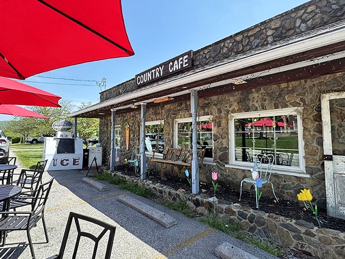 The stone exterior of Country Caf&eacute; stands like a culinary fortress in Harpers Ferry, promising comfort food treasures within those rustic walls.