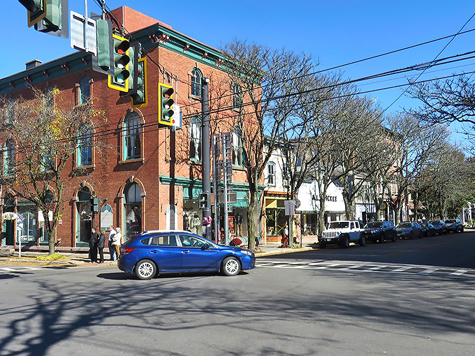 Downtown Rhinebeck bustles with shoppers and locals alike, where historic brick buildings frame a scene that feels like stepping into a kinder, gentler America.