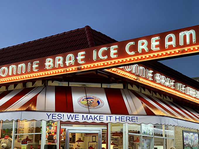 The iconic red-striped awning of Bonnie Brae Ice Cream stands as Denver's beacon of frozen happiness, drawing crowds even on chilly Colorado evenings.