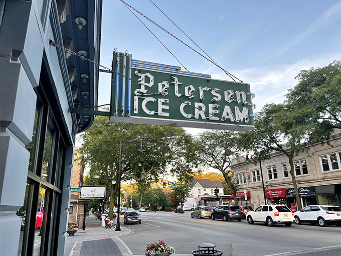 That neon sign doesn't just advertise ice cream&mdash;it's a beacon of hope on a tough day and a promise of something wonderful around that curved corner entrance.