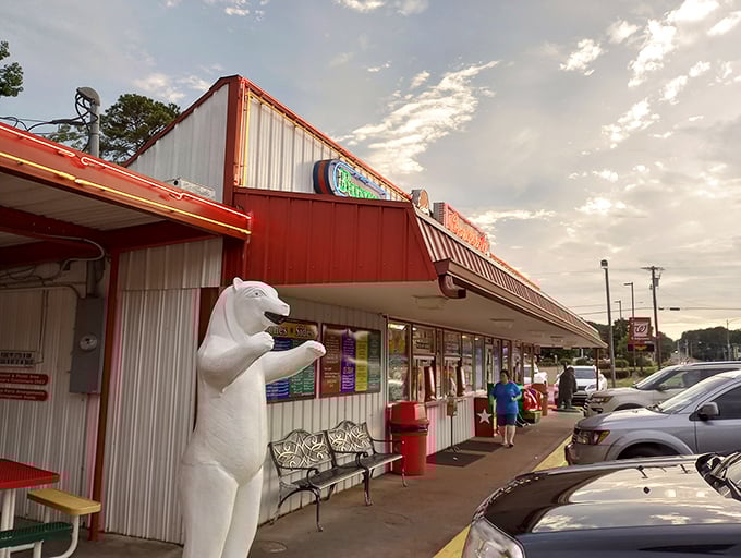 The classic red and white exterior of Spencer's Dairy Kream stands as a beacon of sweet nostalgia in Grenada, promising frozen delights that have stood the test of time.