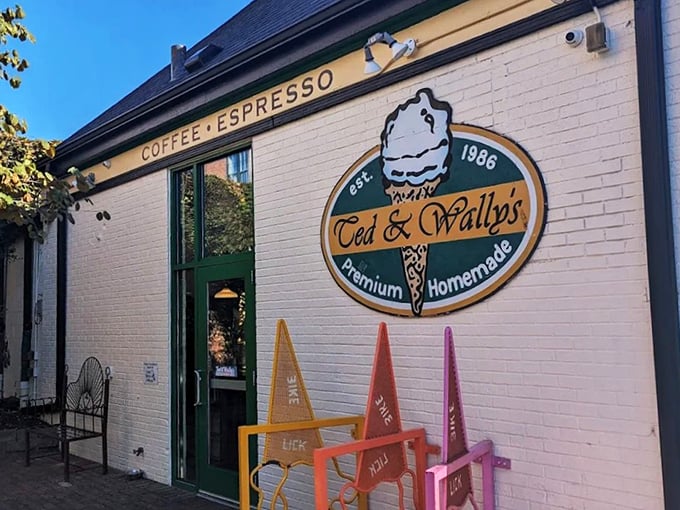 The charming white brick exterior of Ted & Wally's stands as a beacon of sweet promises in Omaha's Old Market district, complete with colorful ice cream cone decorations. 