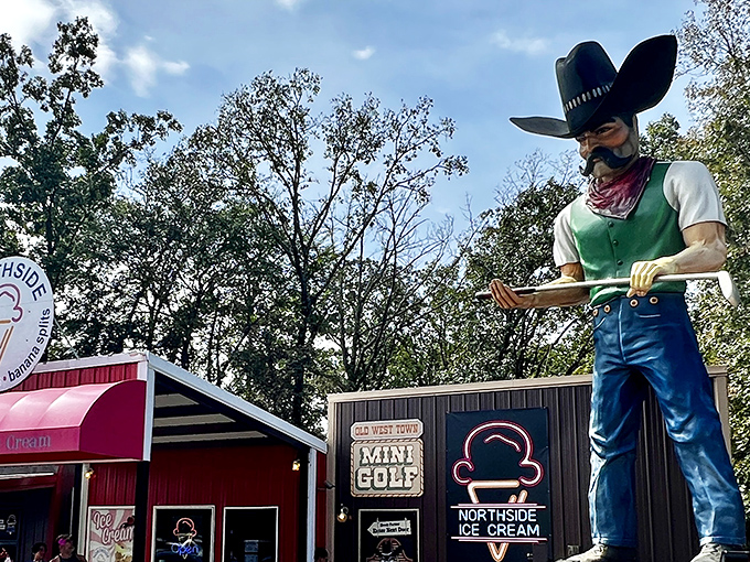 The cowboy statue and giant ice cream cone aren't just landmarks&mdash;they're sentinels guarding the gateway to frozen paradise in Broken Bow.