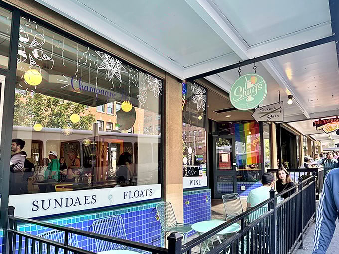 The mint-green sign beckons like a lighthouse for sweet-tooth sailors. Shug's classic storefront promises "SUNDAES FLOATS" in lettering that screams "your diet ends here."