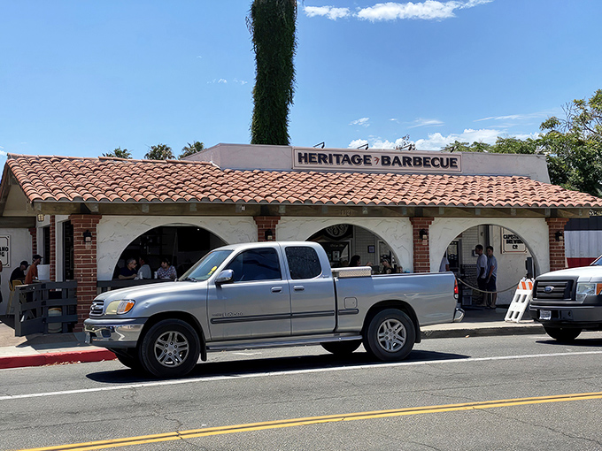 The pilgrimage begins here: Heritage Barbecue's unassuming exterior belies the smoky treasures within. That line? Worth every minute of the wait.