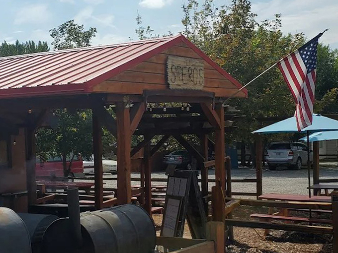 Americana at its smokiest! This rustic pavilion with its signature red roof and waving flag is where barbecue dreams come true in Malad City.