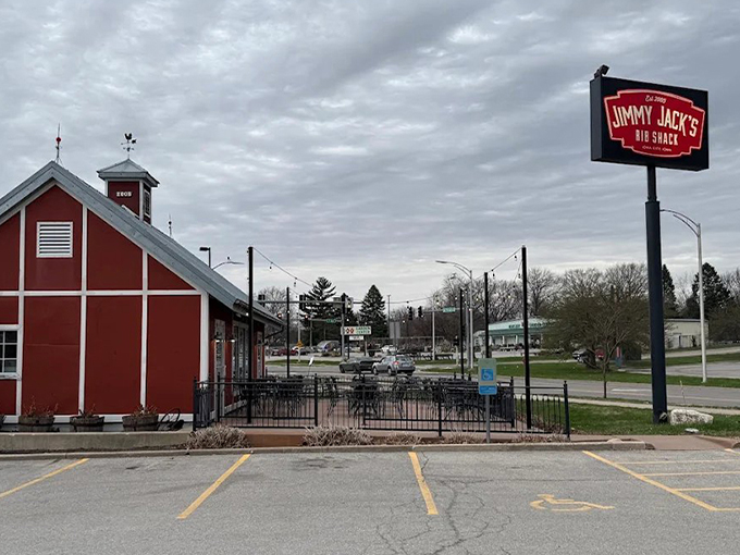 The red barn-like structure with its silo isn't just architectural flair&mdash;it's a beacon calling hungry travelers home to barbecue paradise.