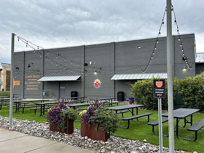 The modern facade of Prime Barbecue stands like a beacon of hope for hungry travelers, promising smoky delights within its contemporary walls.