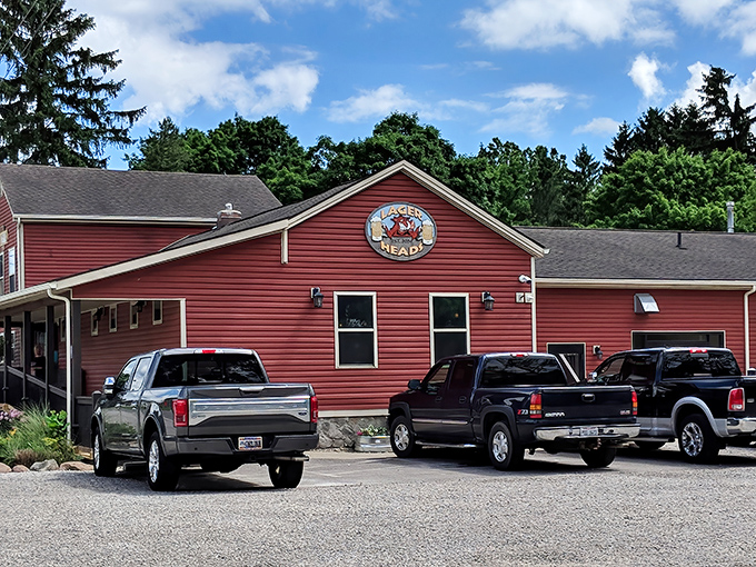 The iconic red exterior of Lager Heads stands like a beacon for BBQ pilgrims, promising smoky delights within those wooden walls.