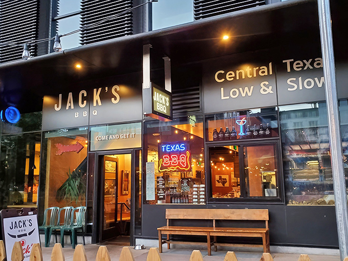 The warm wood-paneled interior of Jack's BBQ creates a cozy Texas oasis in the heart of Seattle's tech hub.
